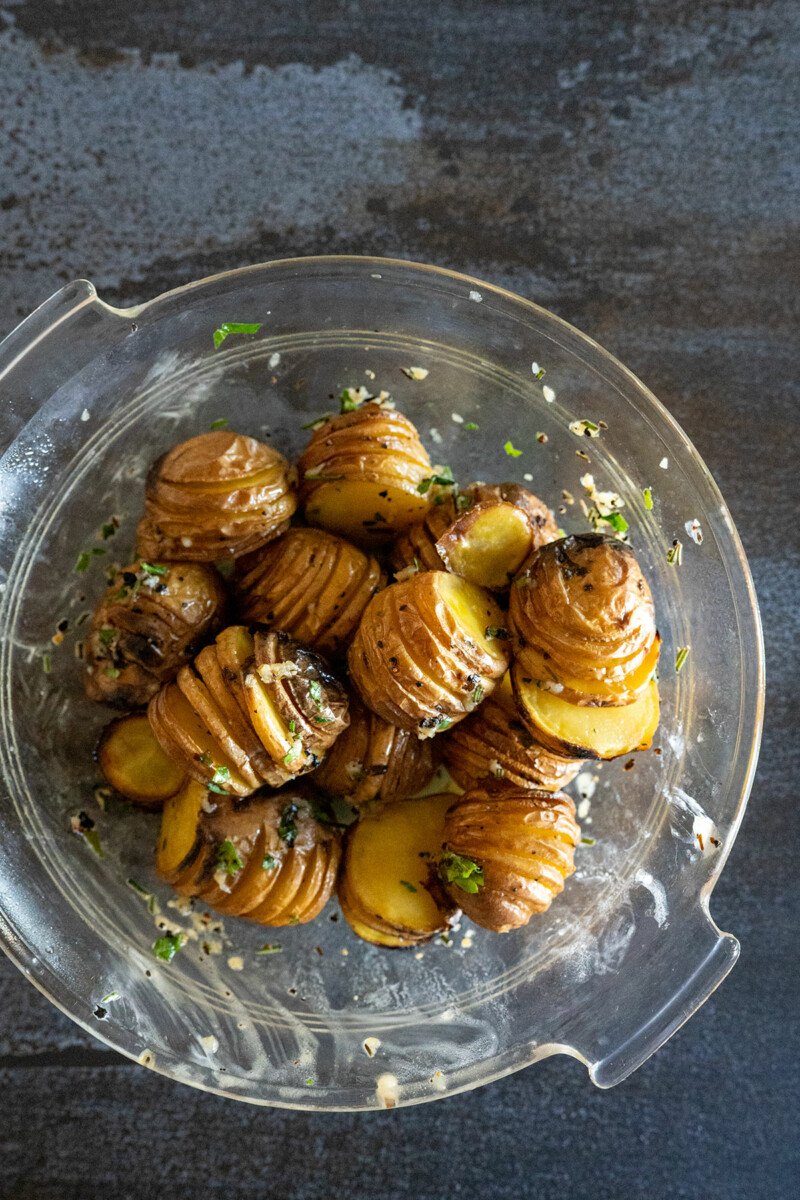 Grilled Mini Hasselback Potatoes with Garlic Herb Butter - Girls Can Grill