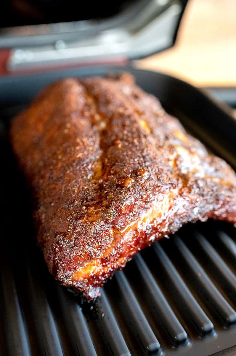 Baby Back Ribs on a Ninja Woodfire Grill - Girls Can Grill